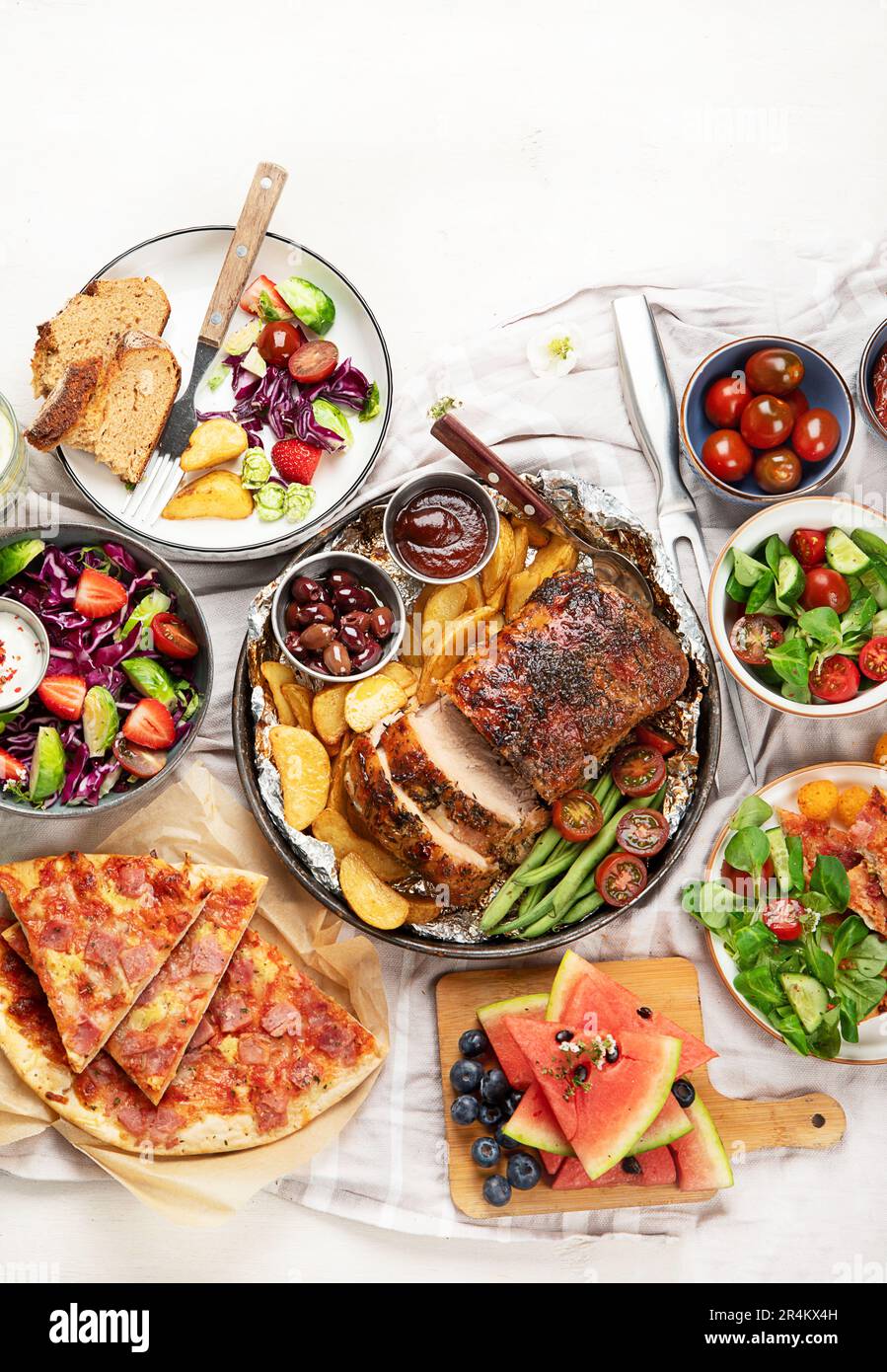 Family dinner or lunch. Many dishes on the table. Top view, copy space ...