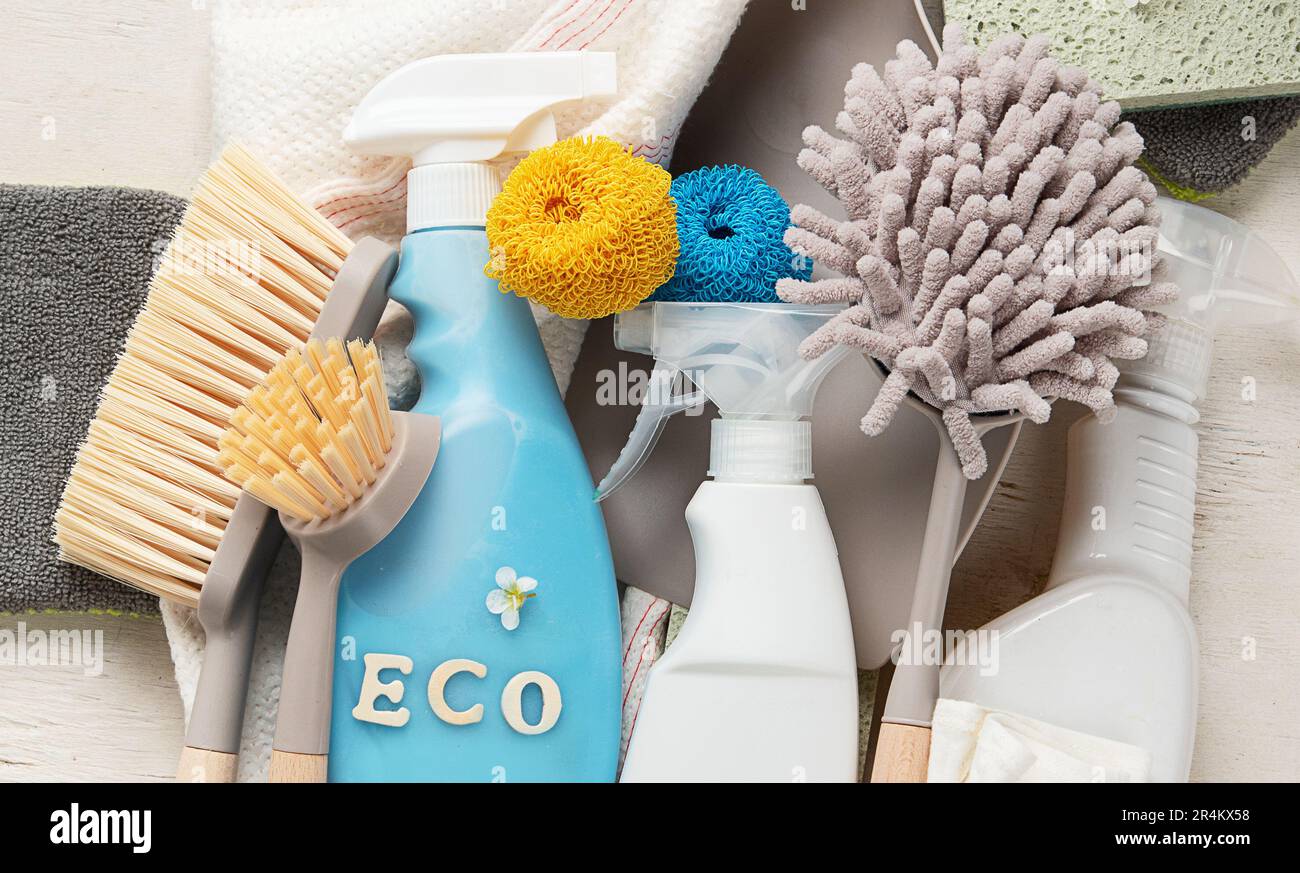 Eco brushes and cleaning products on light background. Eco Cleaner ...