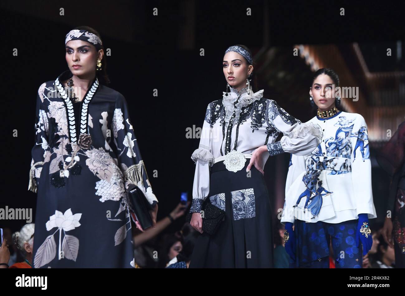 Karachi. 27th May, 2023. Models present creations during a fashion show ...