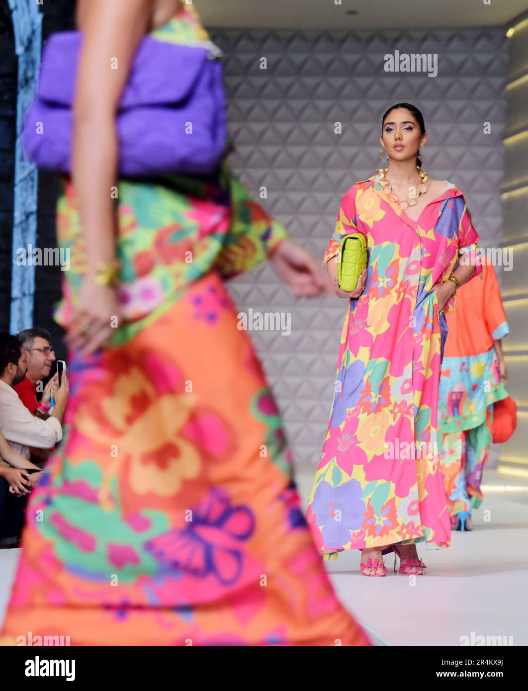 Karachi. 27th May, 2023. Models present creations during a fashion show ...