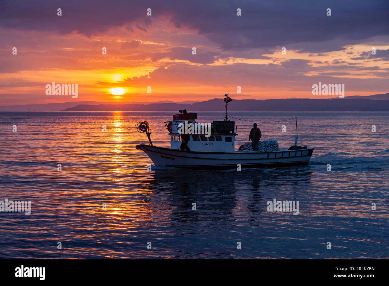 Sunrise of Dardanelles strait at Eceabat, fishing boat, Gelibolu ...