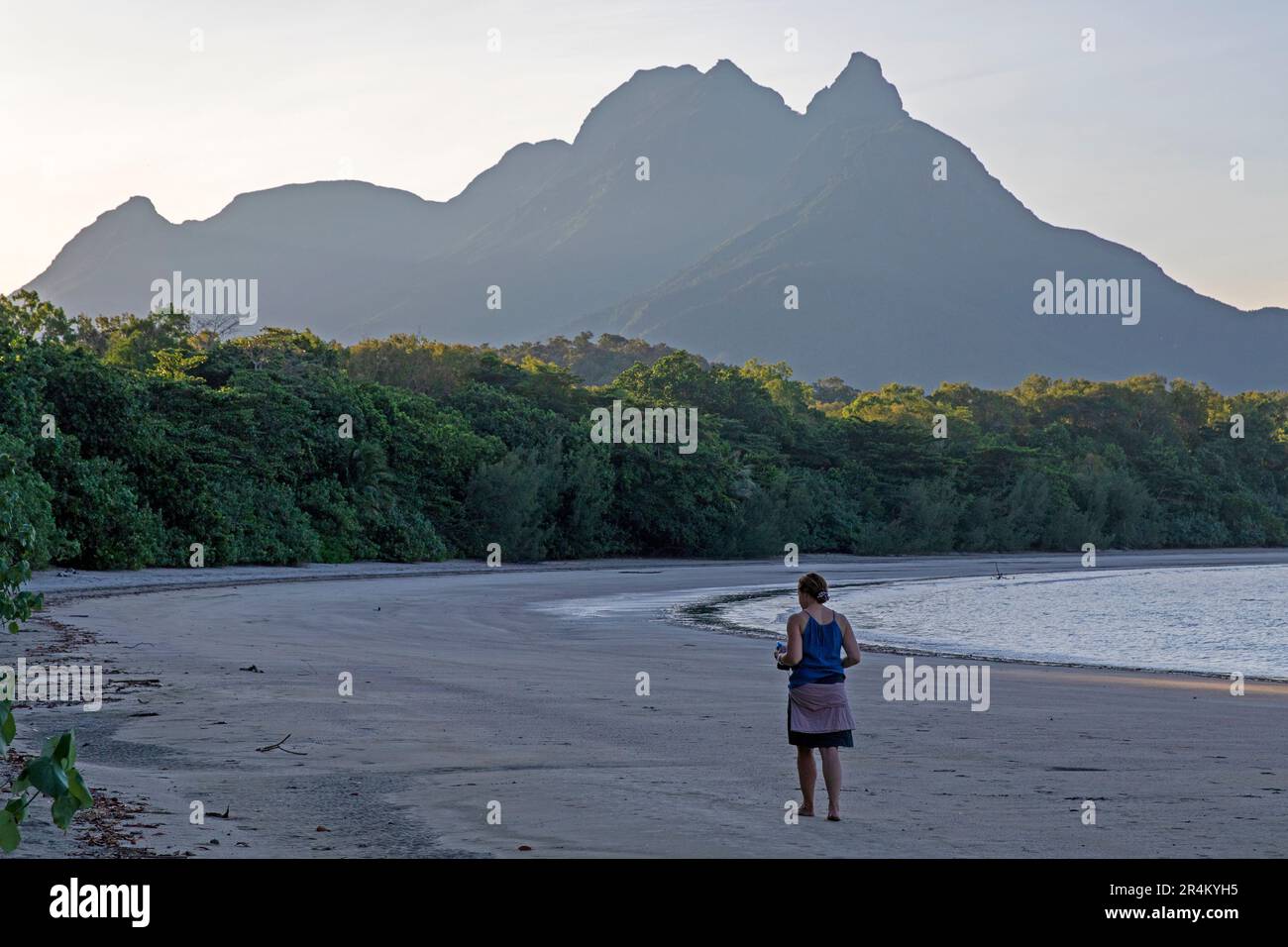 Woman on Zoe Bay, Hinchinbrook Island Stock Photo - Alamy