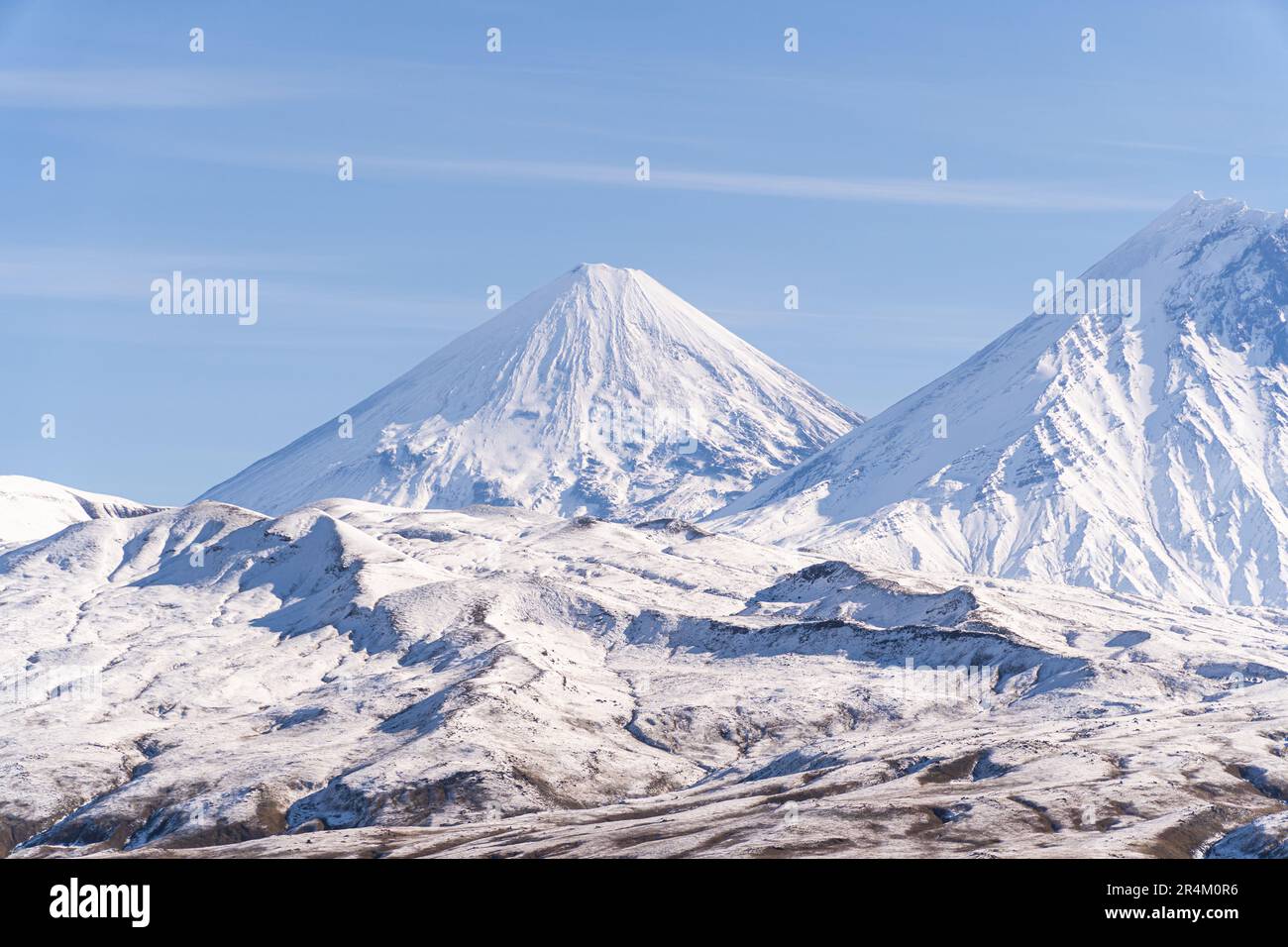 Views of the snowy slopes of two volcanoes in Kamchatka Stock Photo - Alamy