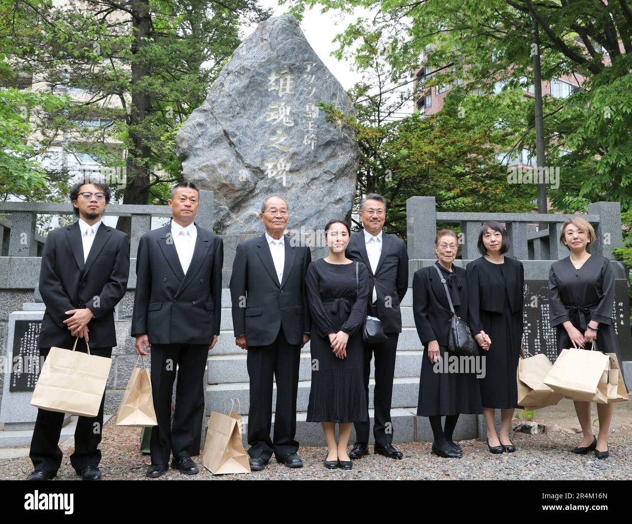 Japanese relatives of the victims of the Battle of Attu mourn at the ...