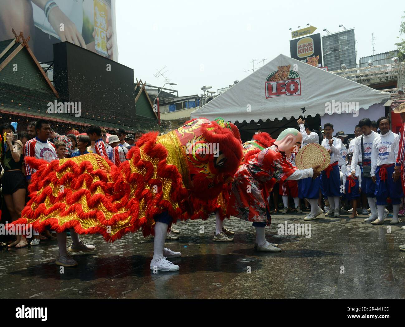 A colorful cultural show of Dragons and colorful characters during the ...