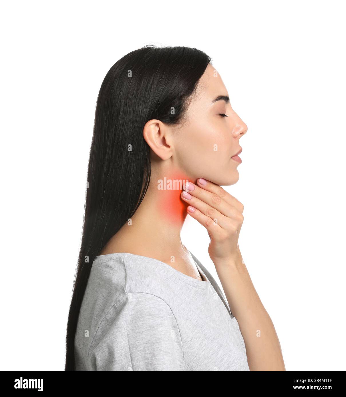 Endocrine system. Young woman doing thyroid self examination on white ...