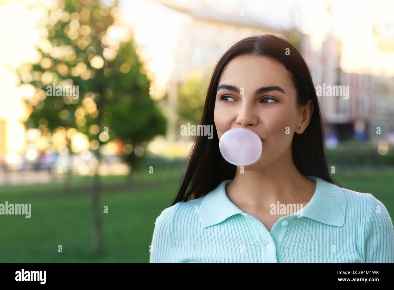 Portrait beautiful woman chewing gum hi-res stock photography and ...