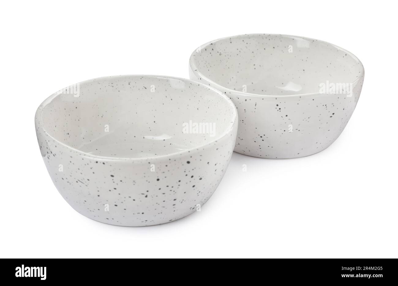 Beautiful empty ceramic bowls on white background Stock Photo - Alamy