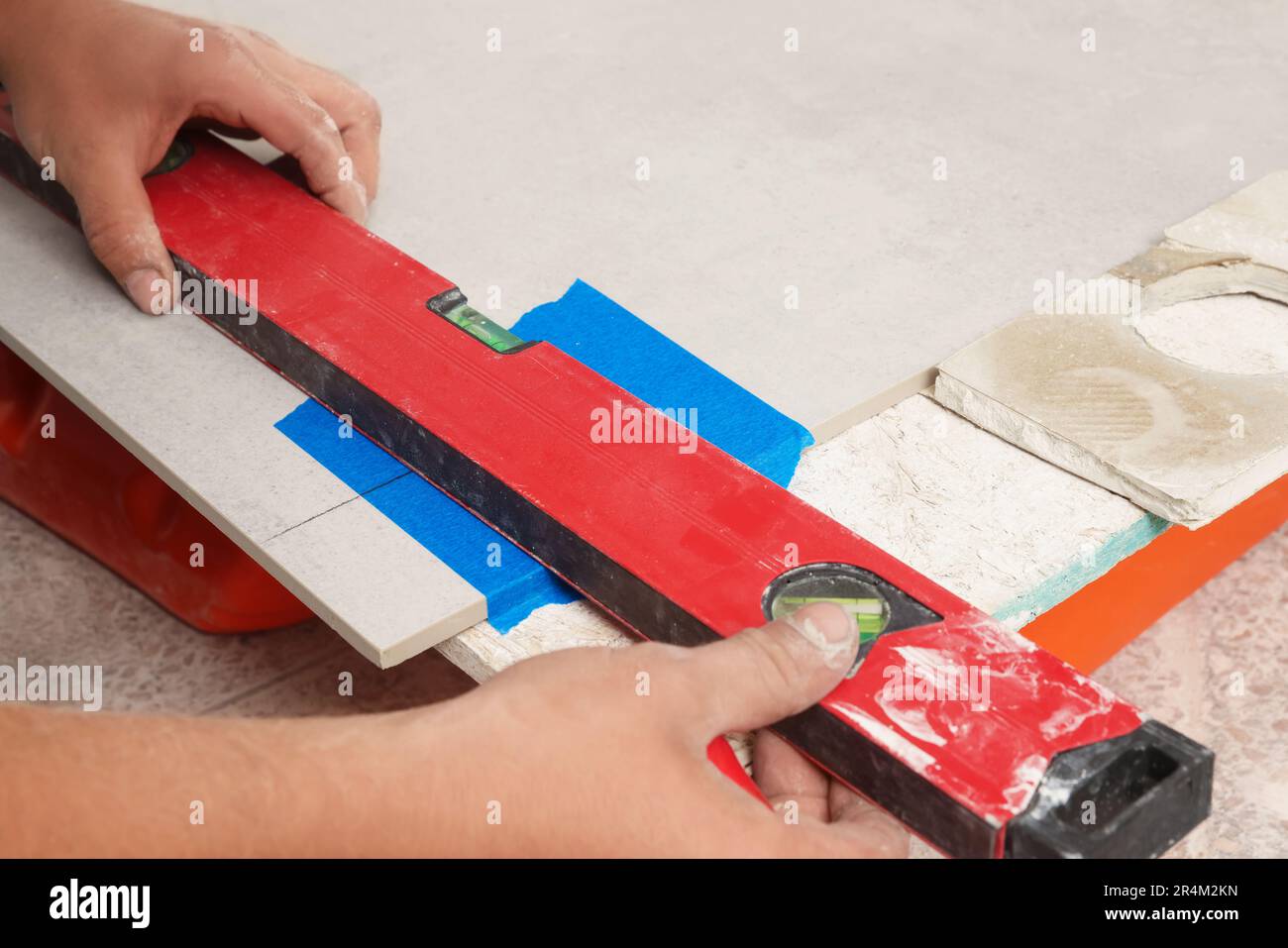 Installing tiles hi-res stock photography and images - Alamy