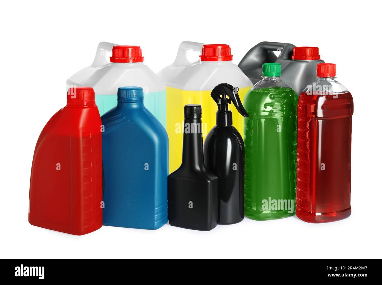 Many bottles and canisters with liquids on white background Stock Photo ...
