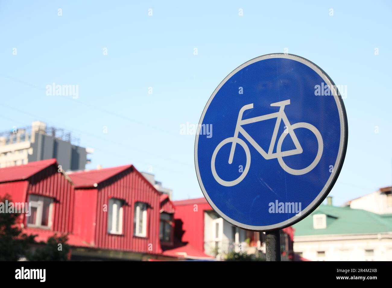 Road sign Cycleway under blue sky in city Stock Photo - Alamy