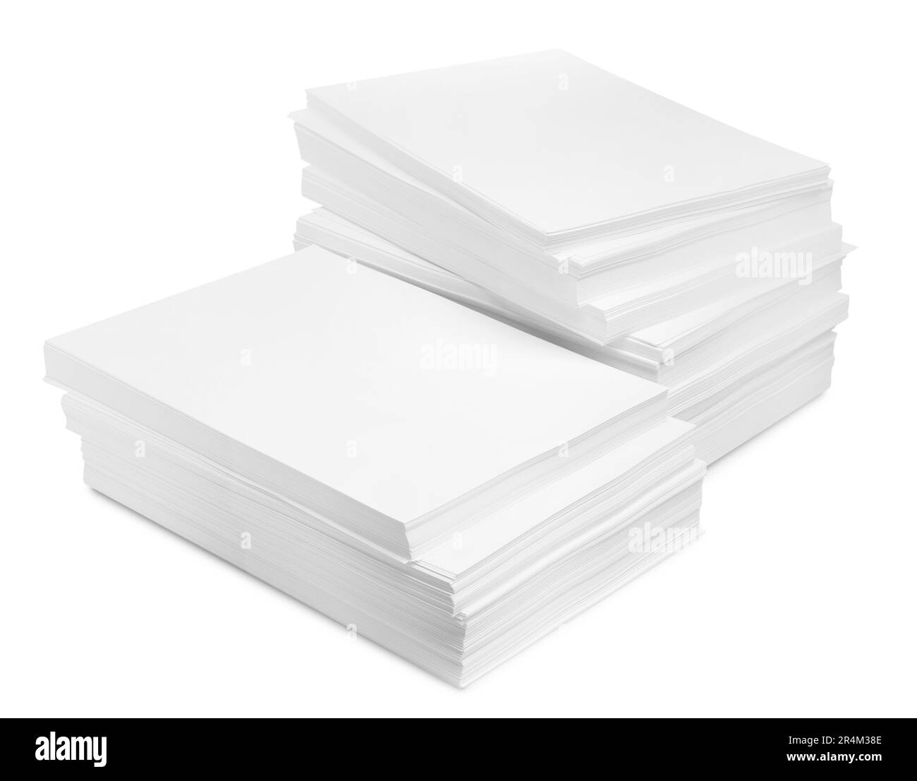 Stacks of paper sheets on white background Stock Photo - Alamy