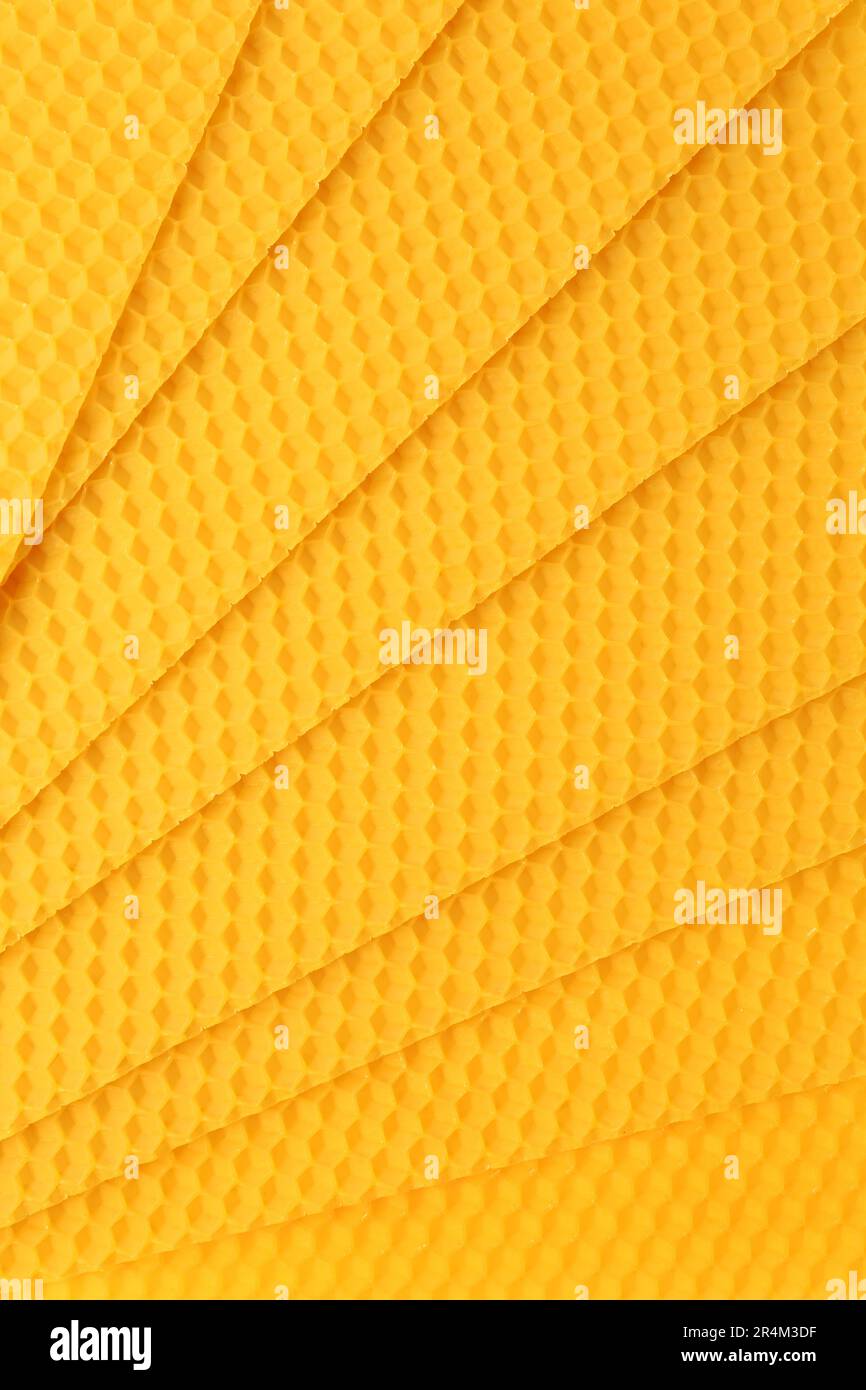 Natural beeswax sheets as background, top view Stock Photo - Alamy