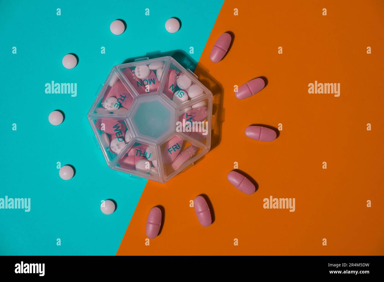 Organizer weekly shots medical pill box with doses of tablets for daily ...