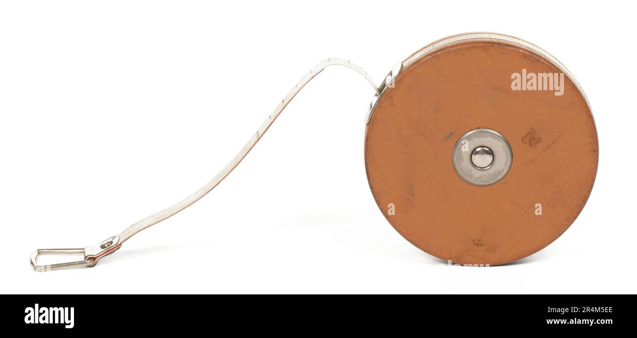 Vintage tape measure isolated on white background Stock Photo - Alamy