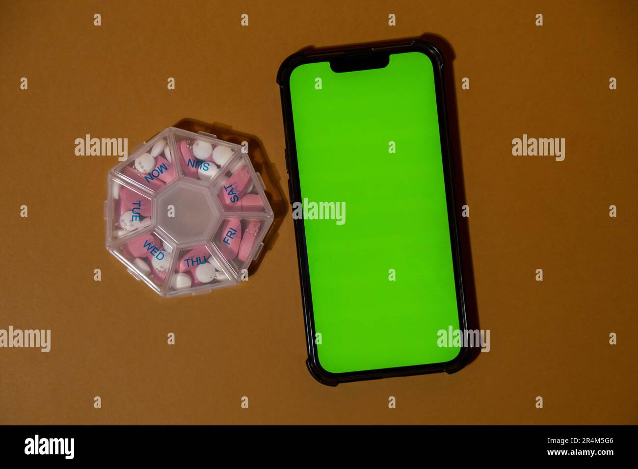 Mobile phone with chroma key green screen copy space template medical ...
