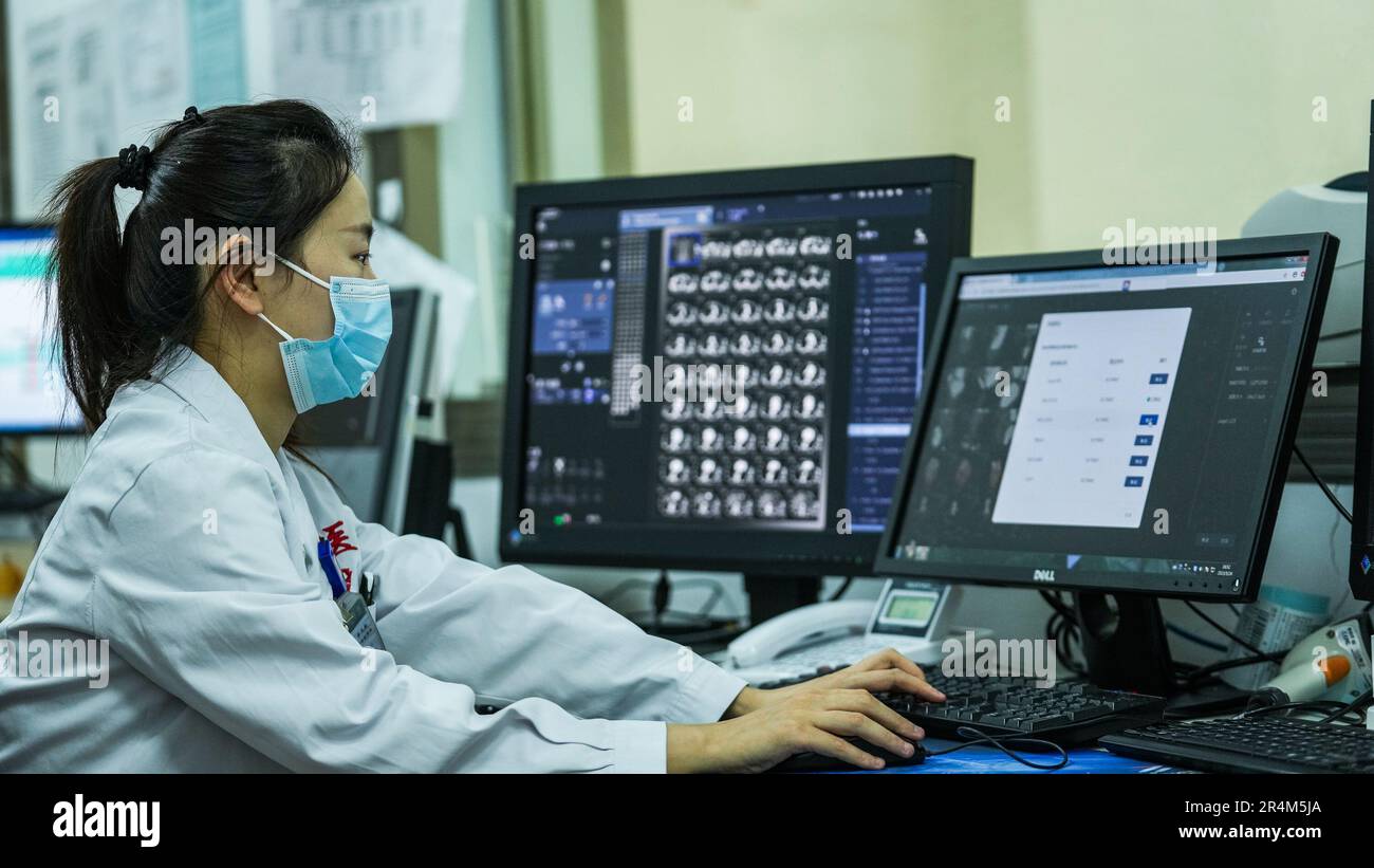 Guiyang, China's Guizhou Province. 24th May, 2023. A doctor uploads ...