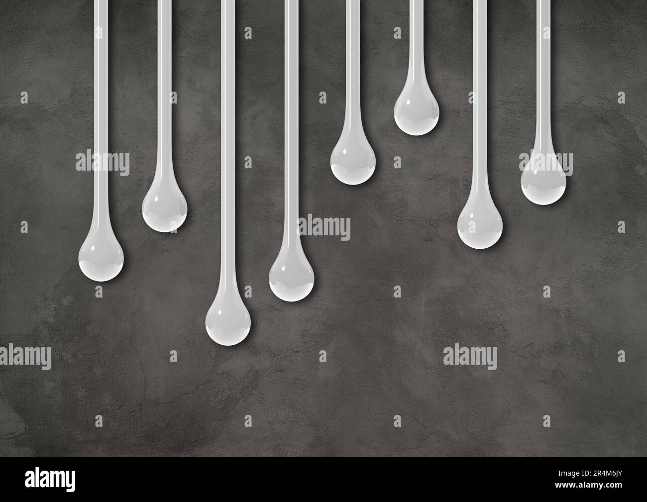 White ink drops isolated on dark concrete wall. Horizontal wallpaper ...