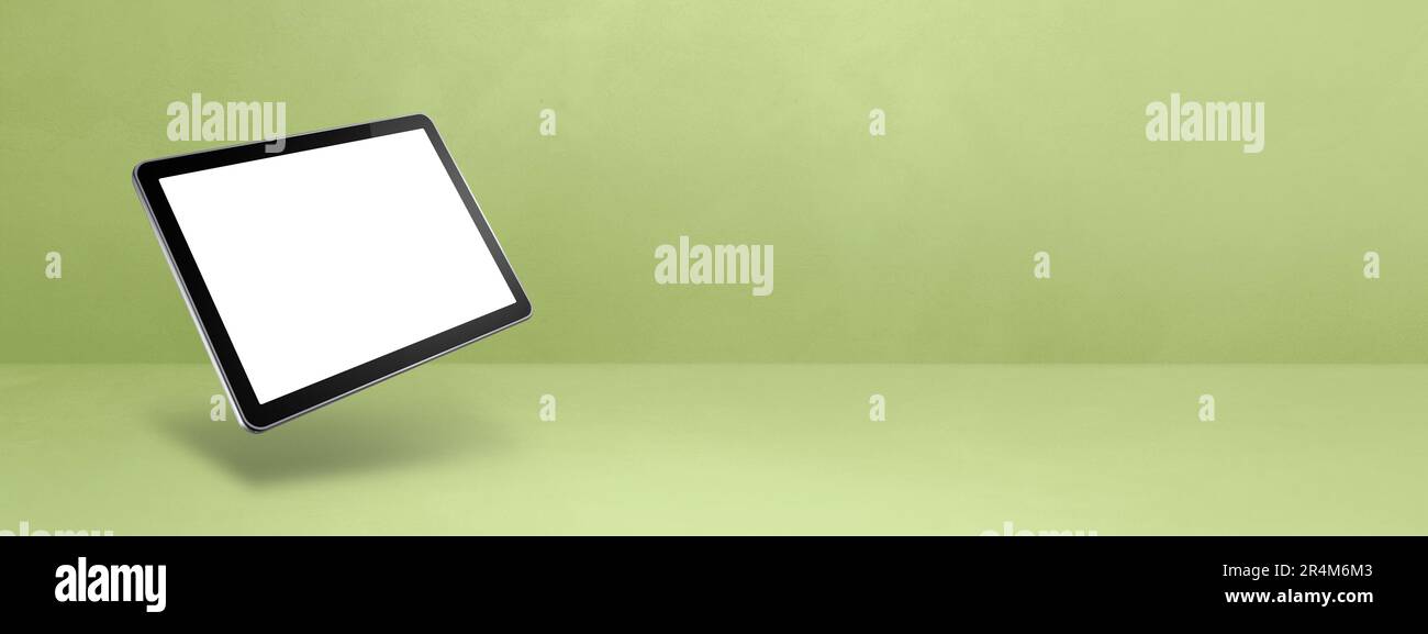 Blank tablet pc computer floating over a green background. 3D isolated ...