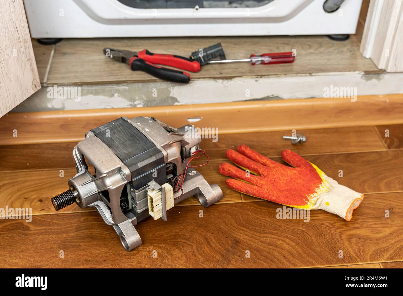 process of repairing the electric motor of a washing machine Stock ...