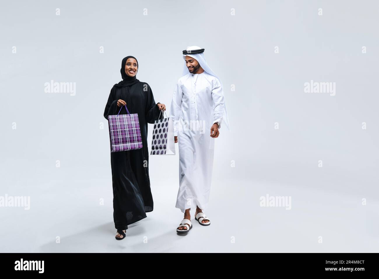 Beautiful arab middle-eastern happy couple of lovers wearing ...