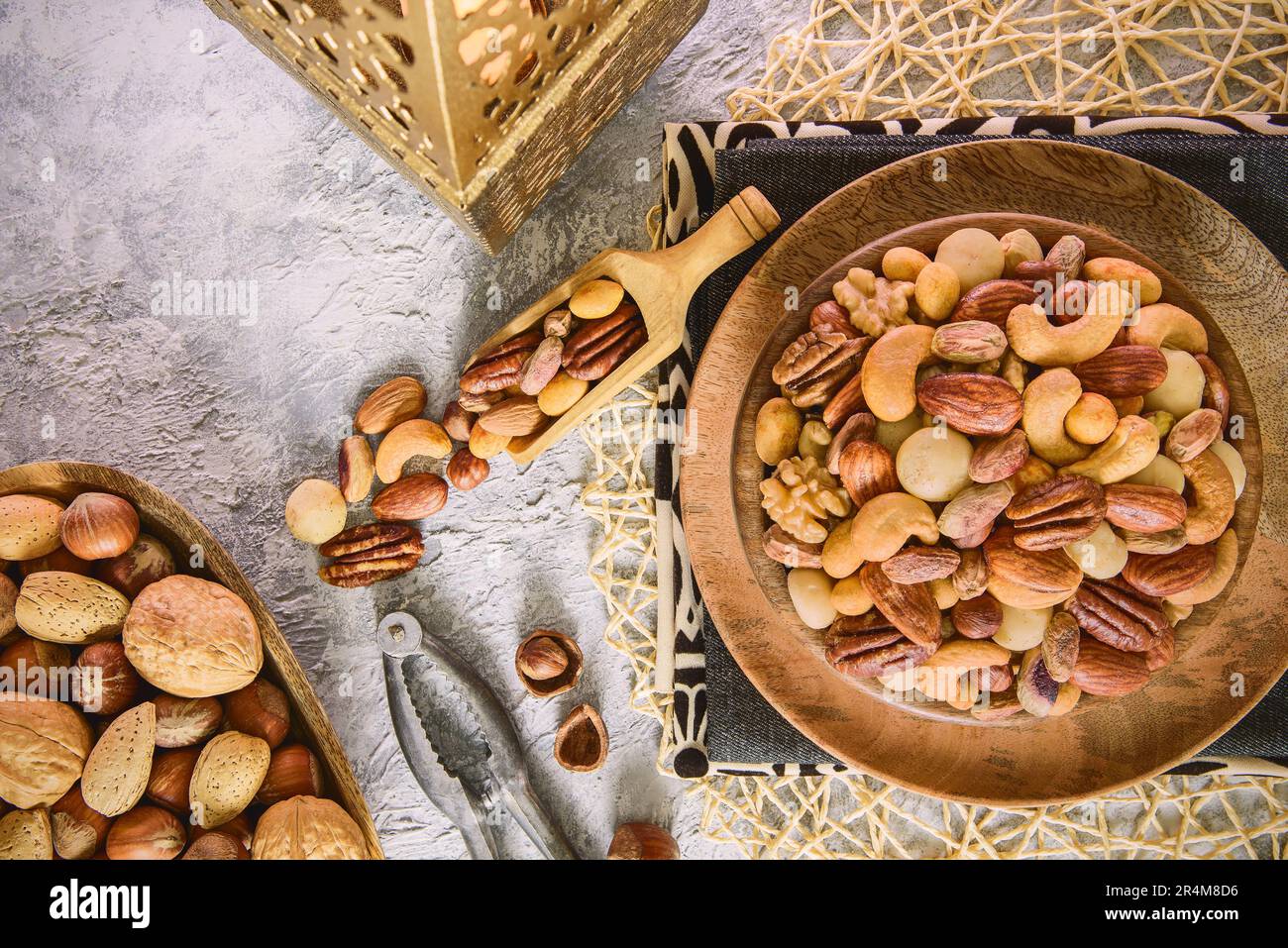Ramadan celebration. Mix of Crispy salted nuts. Top view with close up ...