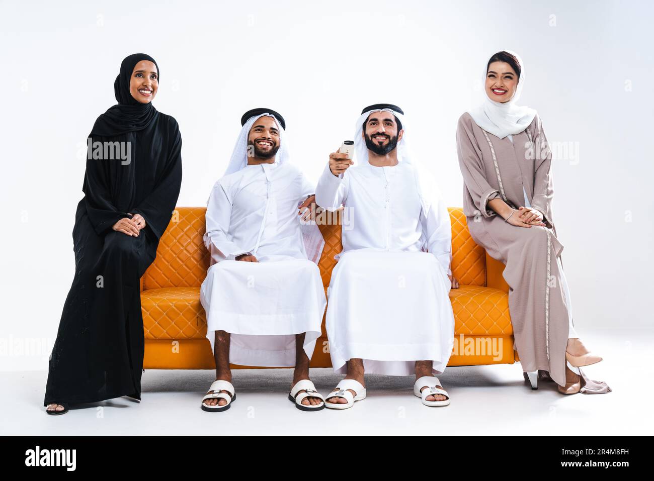 Beautiful arab middle-eastern happy group of friends wearing ...