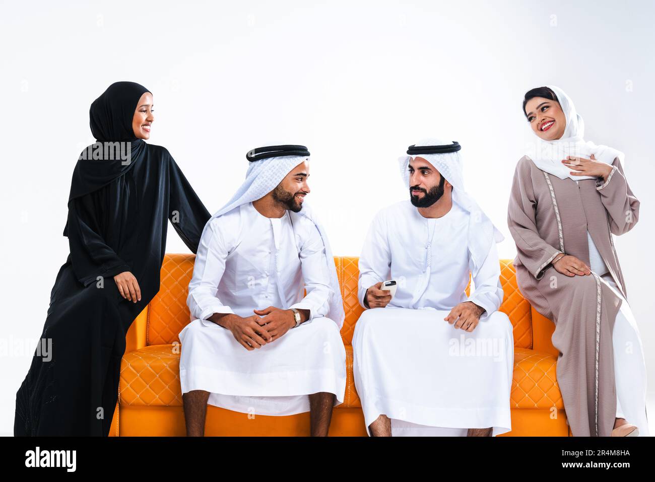 Beautiful arab middle-eastern happy group of friends wearing ...