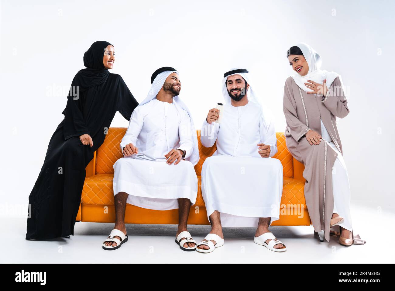 Beautiful arab middle-eastern happy group of friends wearing ...