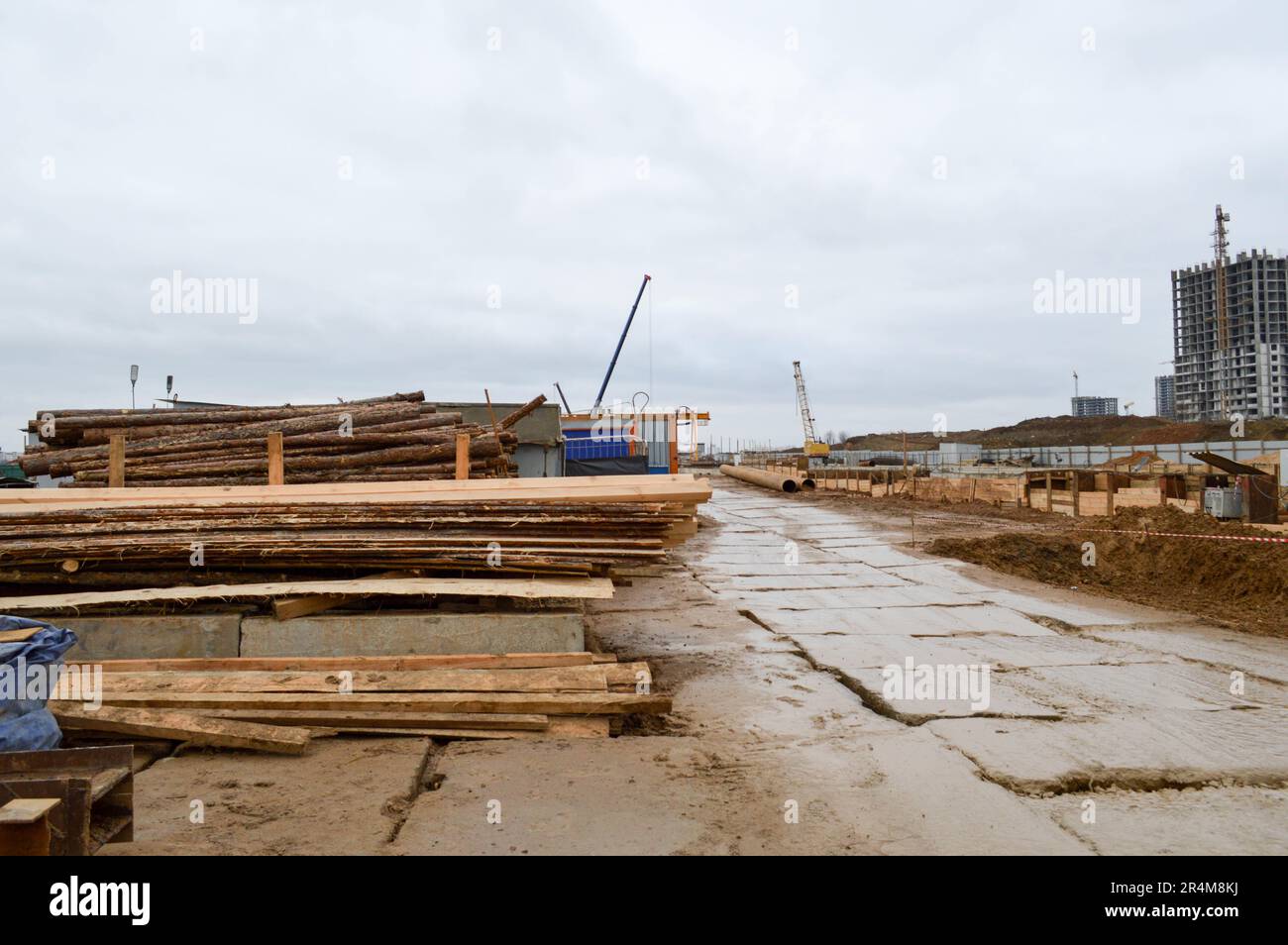 Lots of long wooden natural planed boards and sticks at a sawmill. The ...