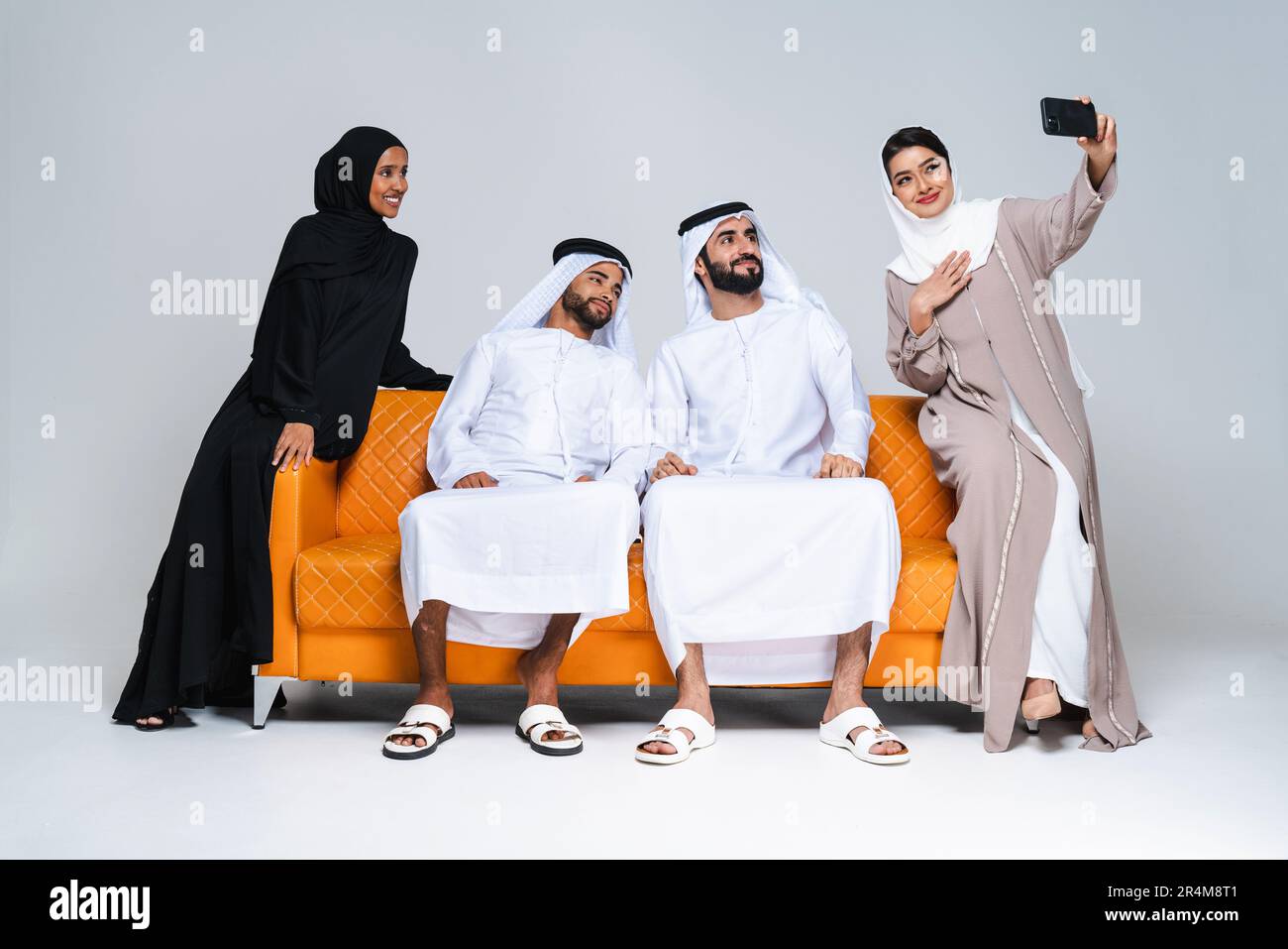 Beautiful arab middle-eastern happy group of friends wearing ...