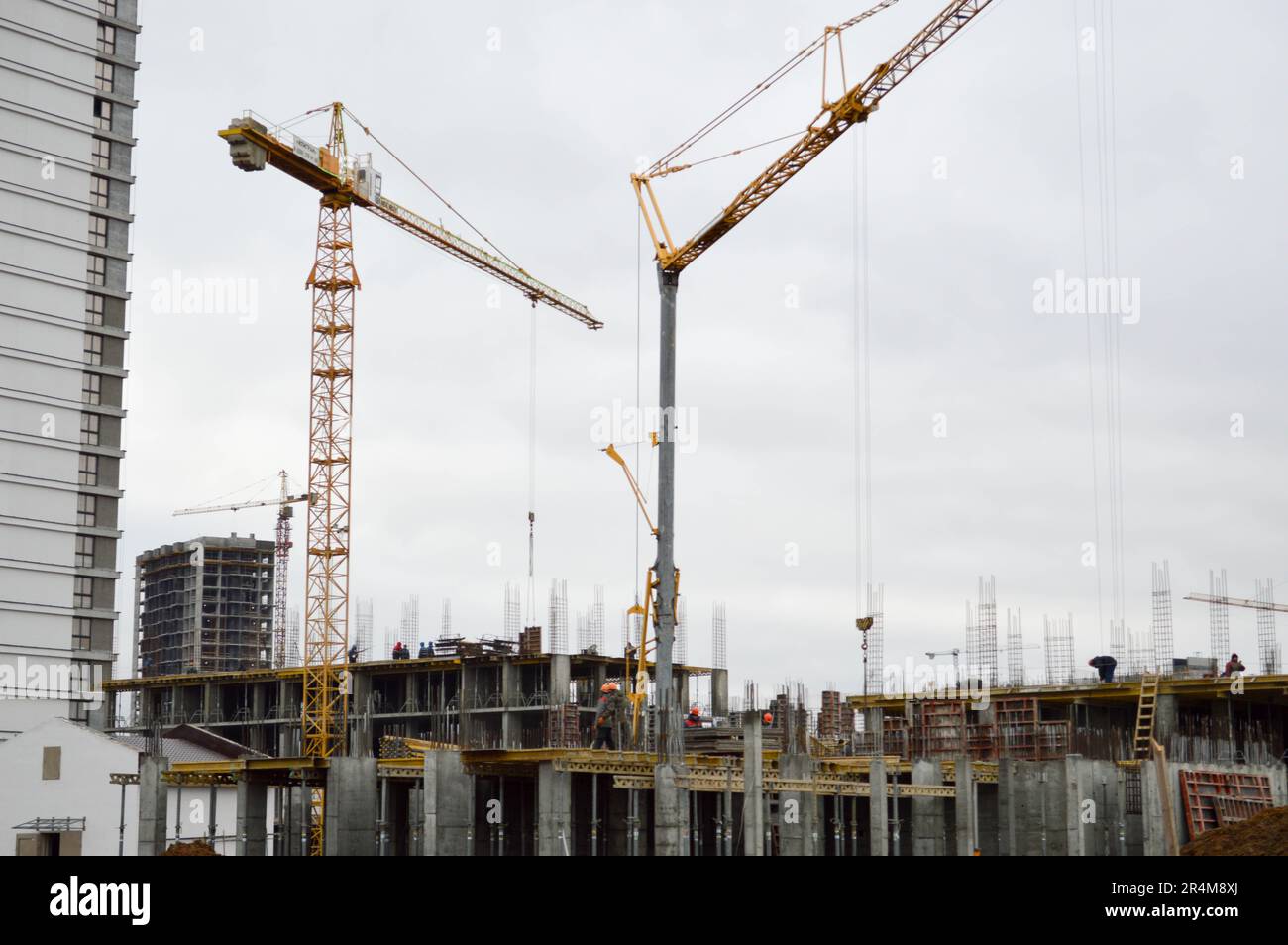 Large powerful construction cargo industrial crane on a construction ...