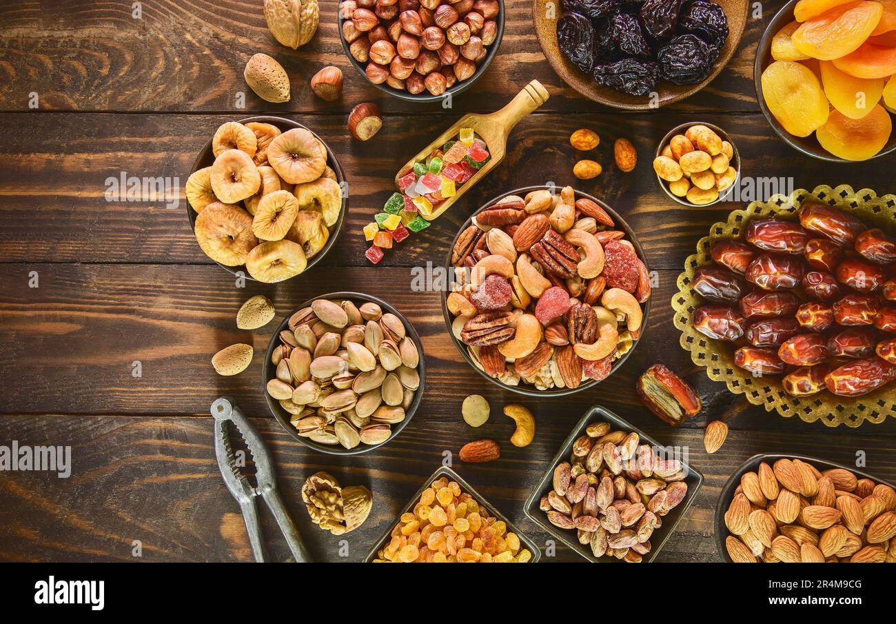 Ramadan celebration. Mix of dried fruits, dates and crispy nuts. Top ...