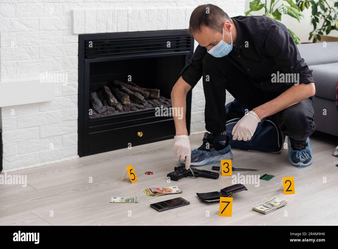 Detective Collecting Evidence in a Crime Scene. Forensic Specialists ...