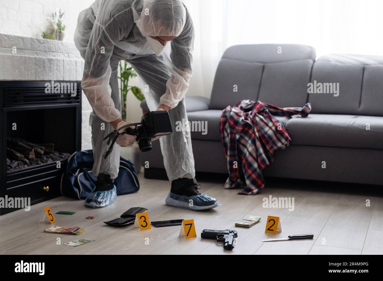 Crime scene investigation - collecting pistol and cartridges by ...