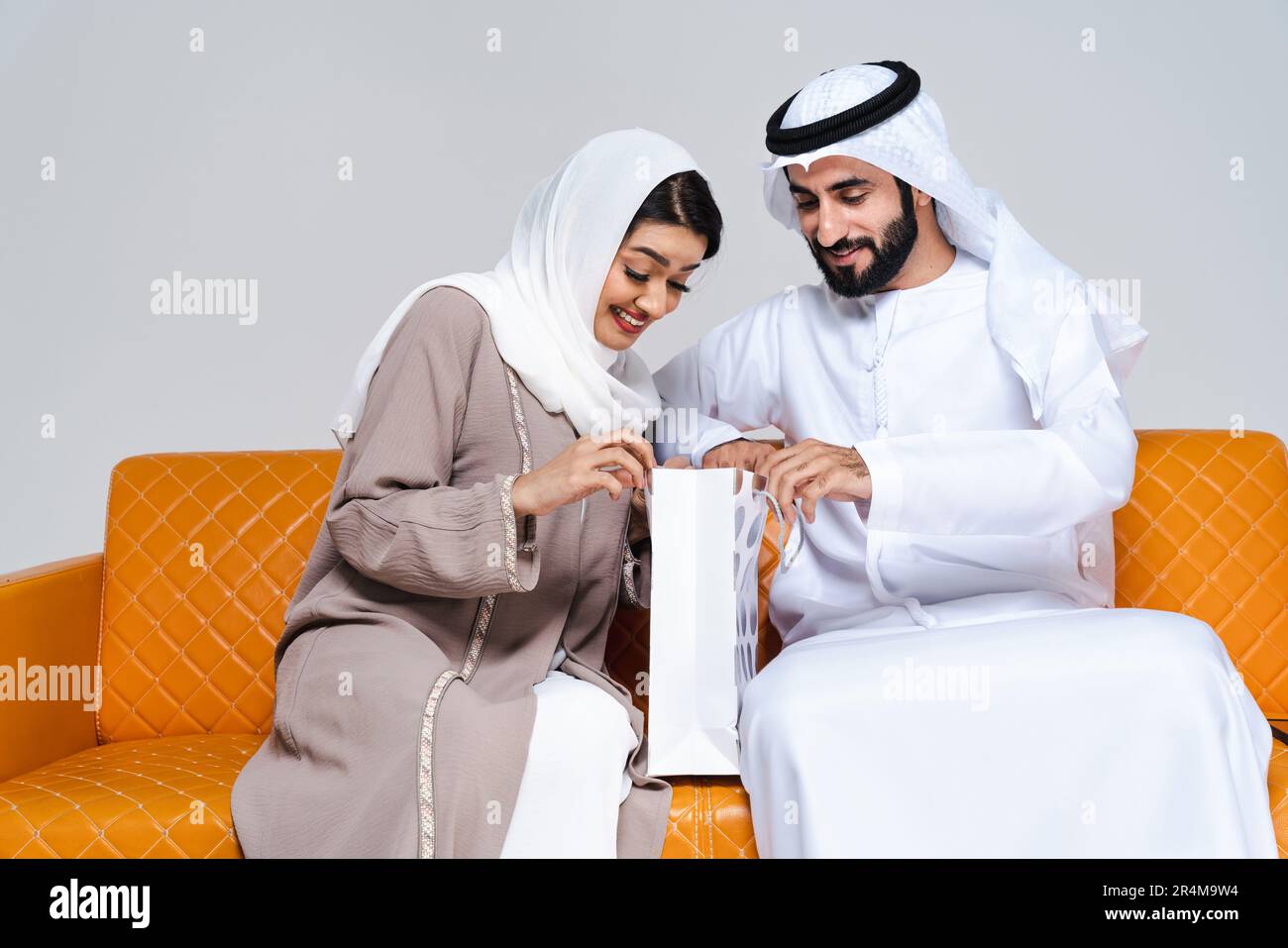 Beautiful arab middle-eastern happy couple of lovers wearing ...