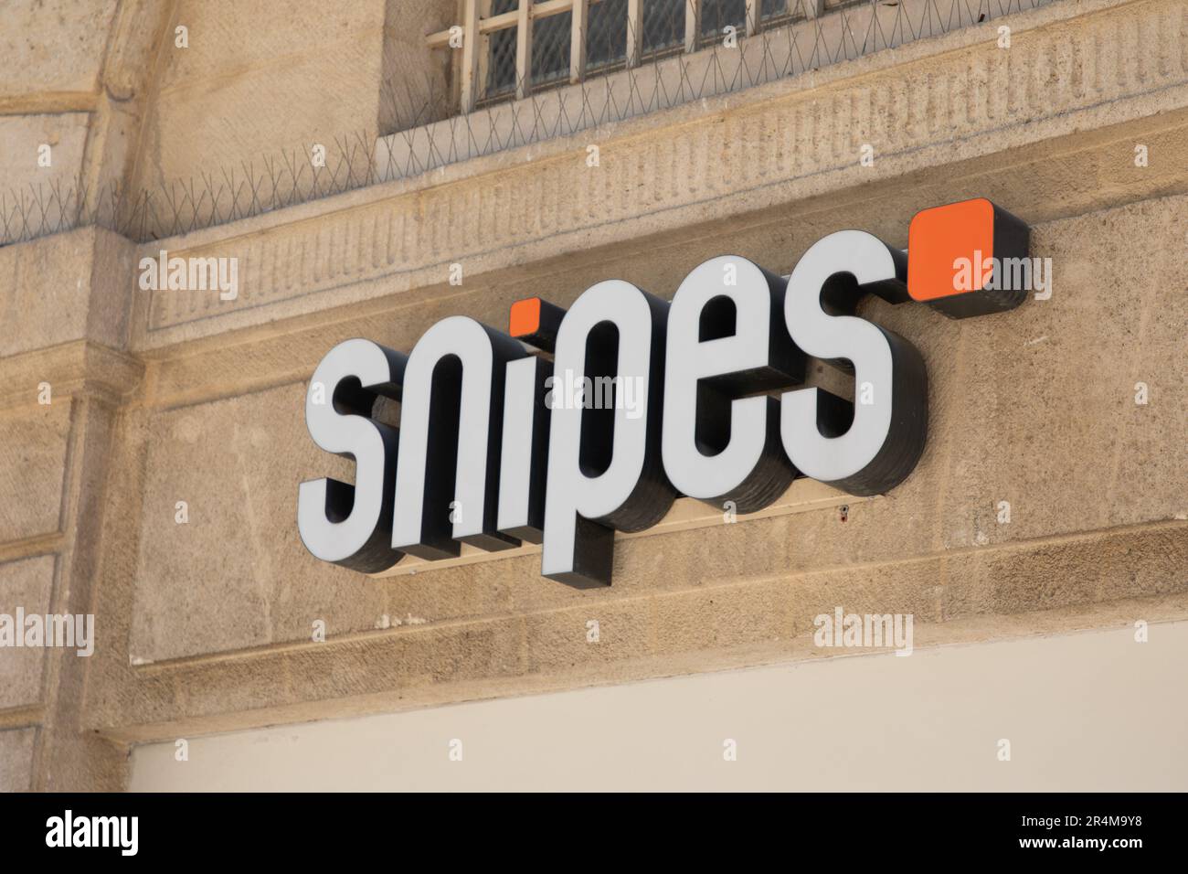 Bordeaux , Aquitaine France - 05 19 2023 : snipes sign logo and text brand front of facade store ...