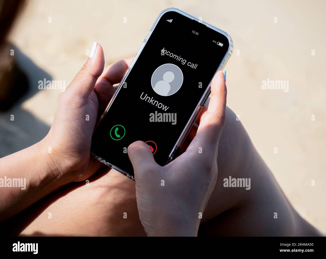 Incoming call with unknown caller, malicious phone calls concept. Unknown number displayed ...