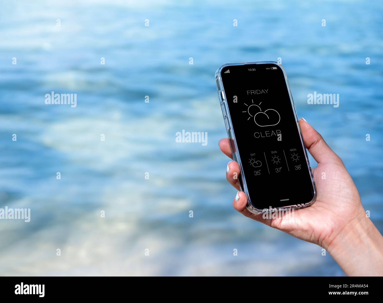 Weather forecast on smartphone. Clear weather, display app on Friday ...