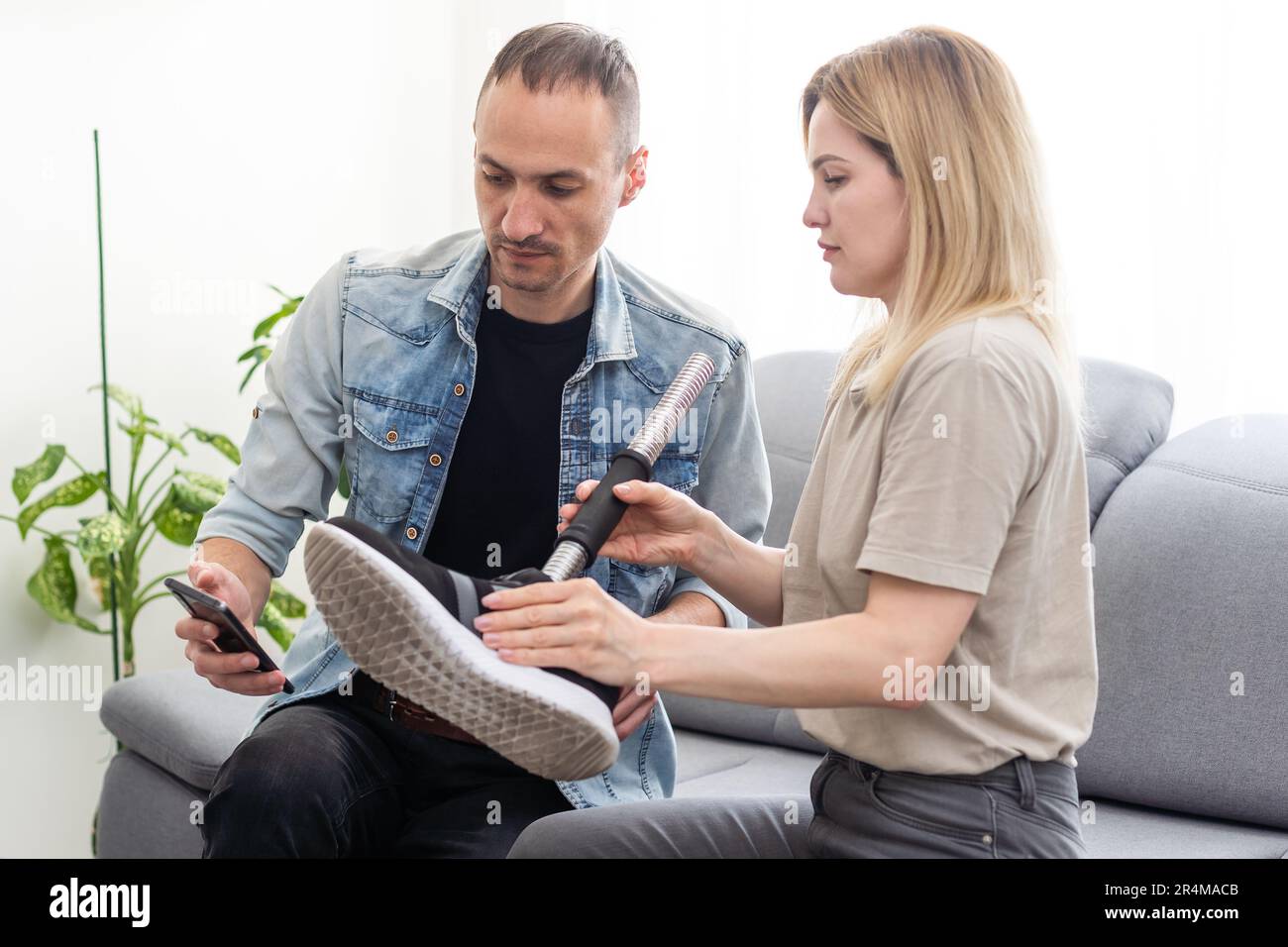 Modern Hospital Physical Therapy: Doctor Uses Tablet Computer, Helps ...