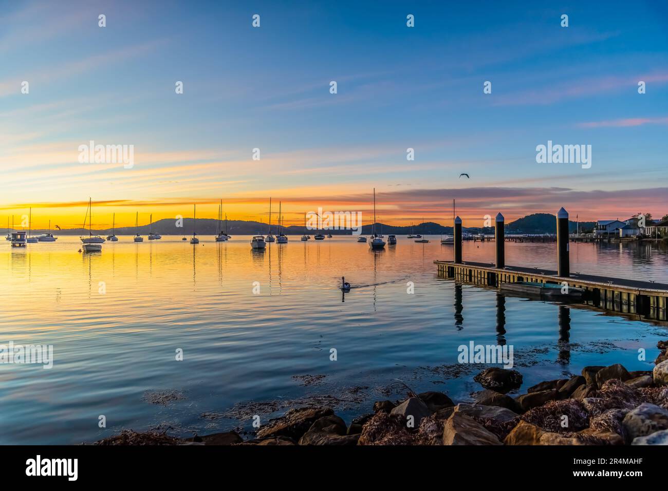 High cloud sunrise over Brisbane Water at Koolewong and Tascott on the ...