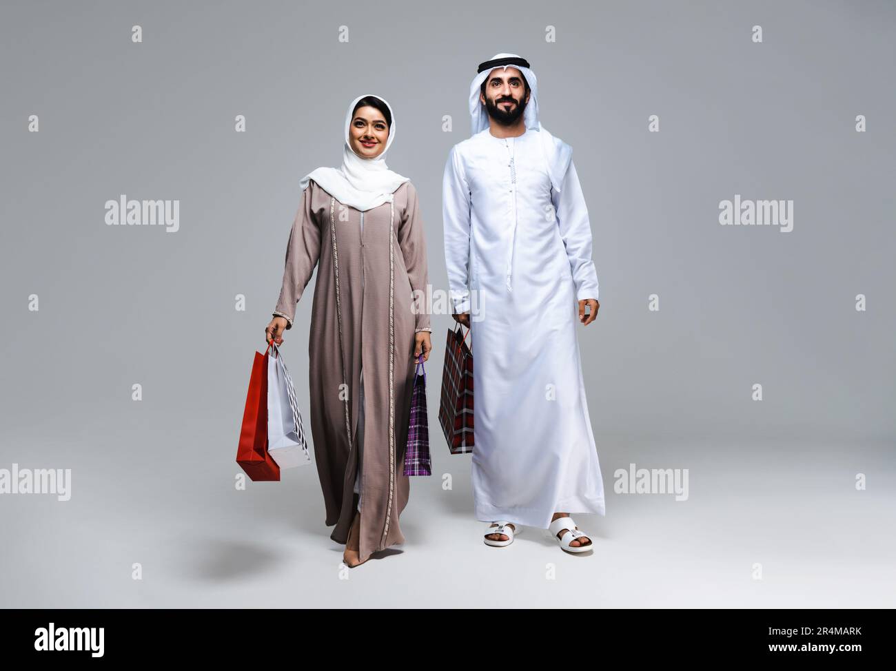 Beautiful arab middle-eastern happy couple of lovers wearing ...