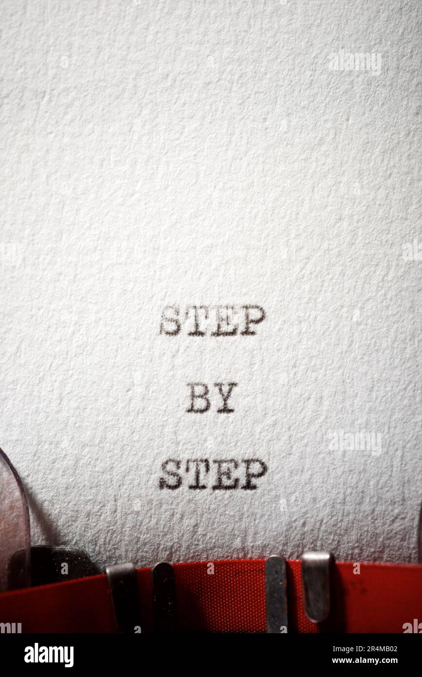Step by step text written with a typewriter Stock Photo - Alamy