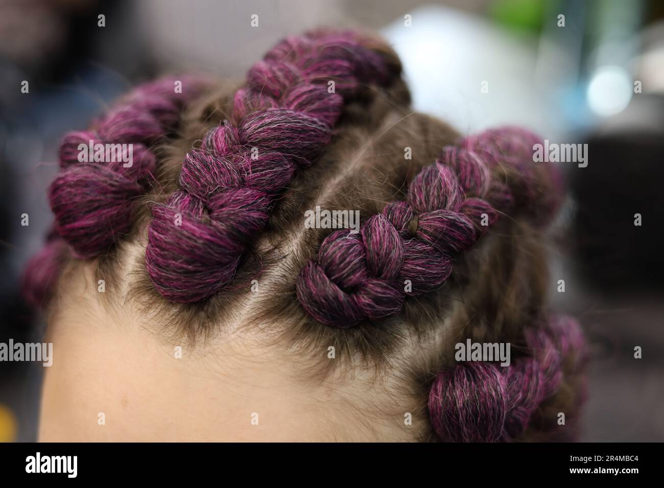 Braid the pigtails into a ponytail and an afro-tail Stock Photo - Alamy