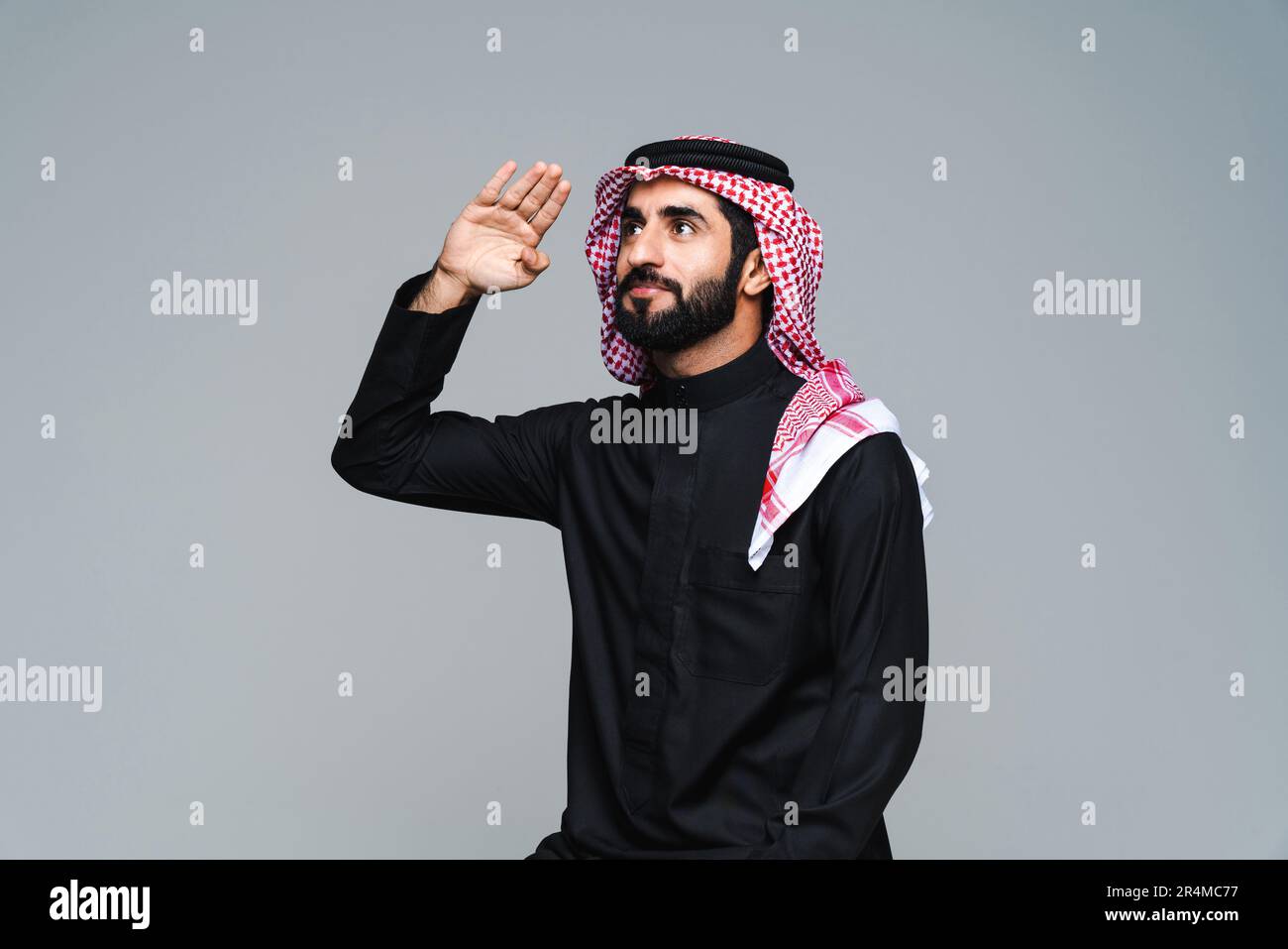Handsome arab middle-eastern saudi arabian man with traditional saudi ...
