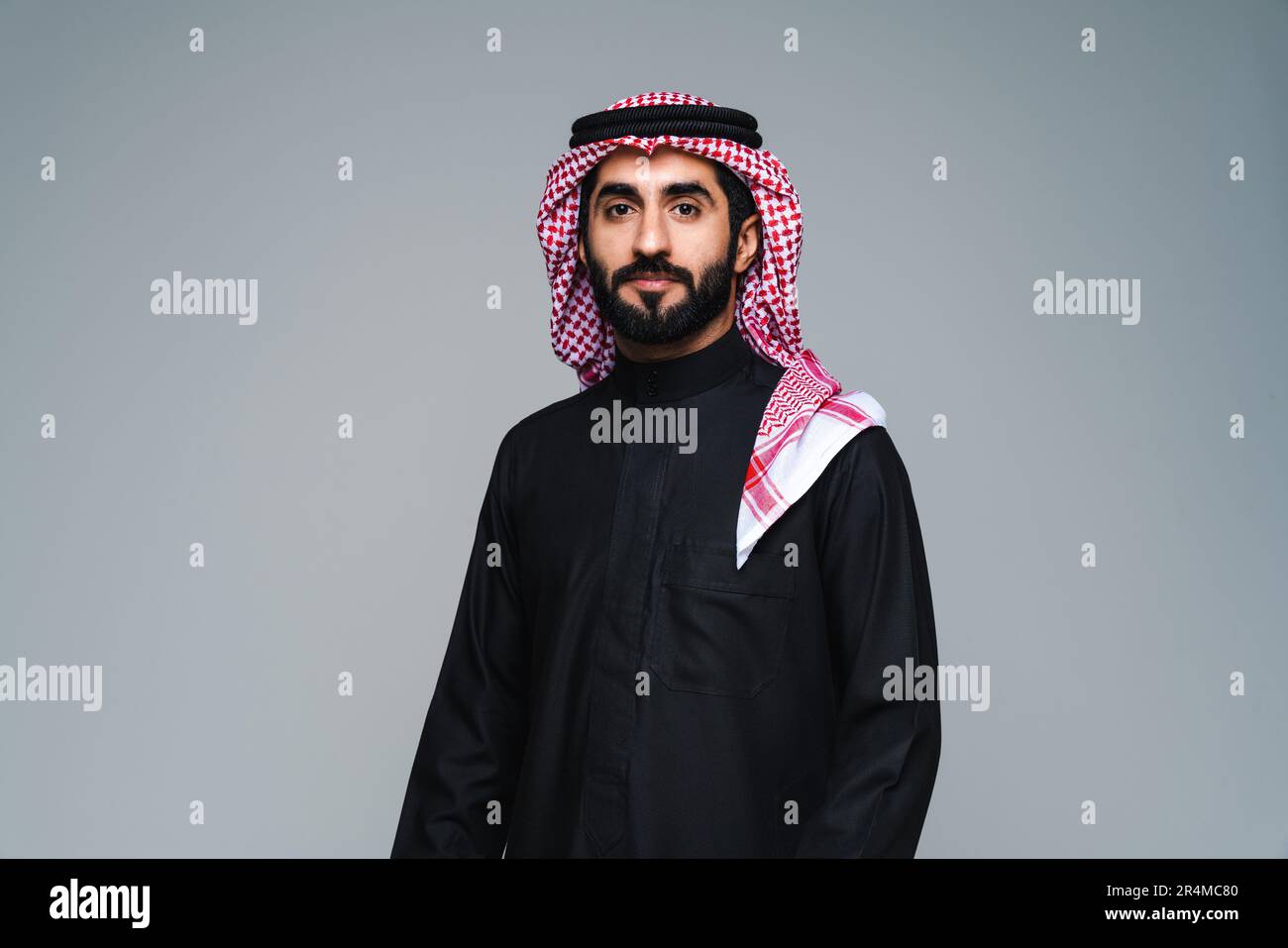 Handsome arab middle-eastern saudi arabian man with traditional saudi ...