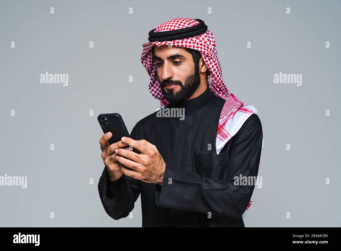 Handsome arab middle-eastern saudi arabian man with traditional saudi ...