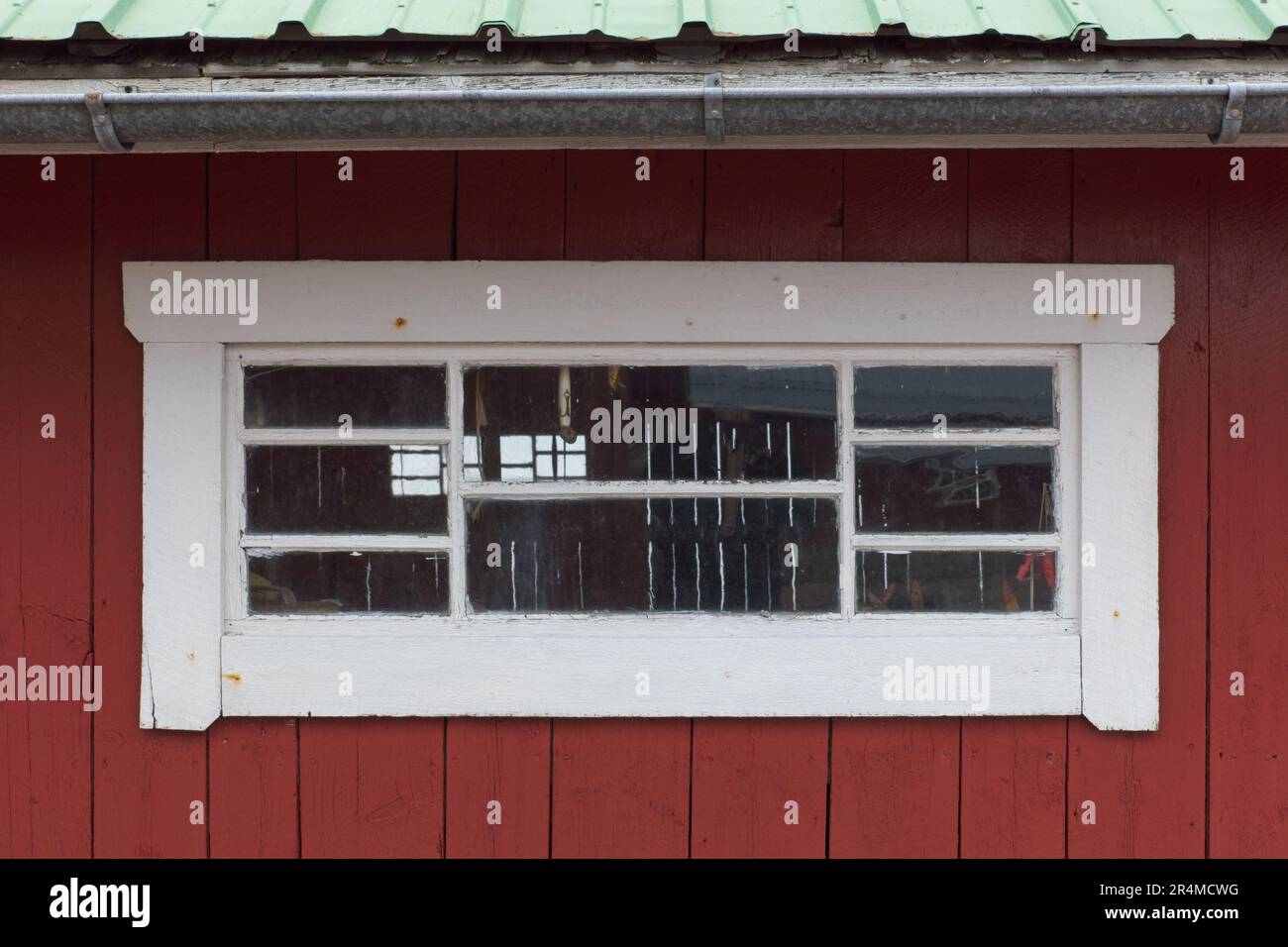 Old white painted framed window on a wood building Stock Photo - Alamy