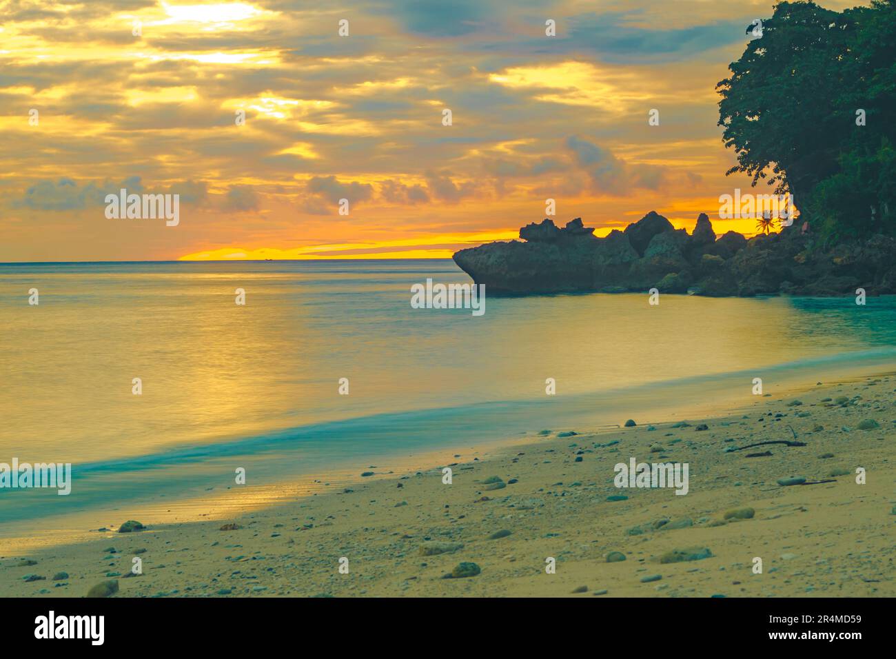 Beach Landscape with rock formation during sunrise on Sumurtiga beach ...