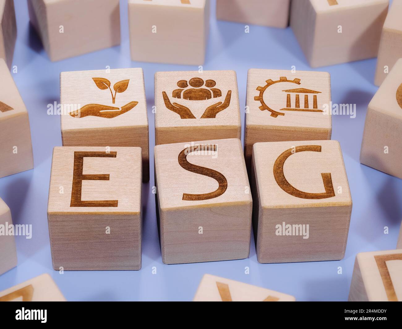 ESG symbols on wooden cubes as a concept of corporate business ...